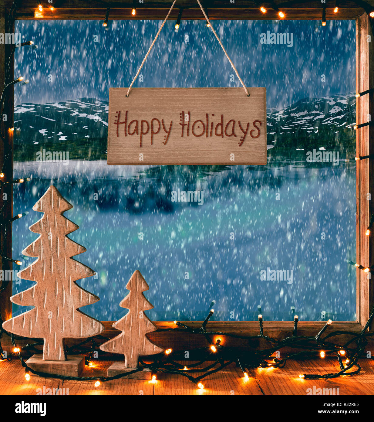 Christmas Window, Calligraphy Happy Holidays, Fairy Lights Stock Photo ...