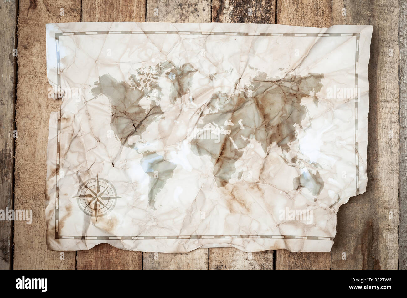 World map with border on broken Vintage Crumpled paper texture on ...