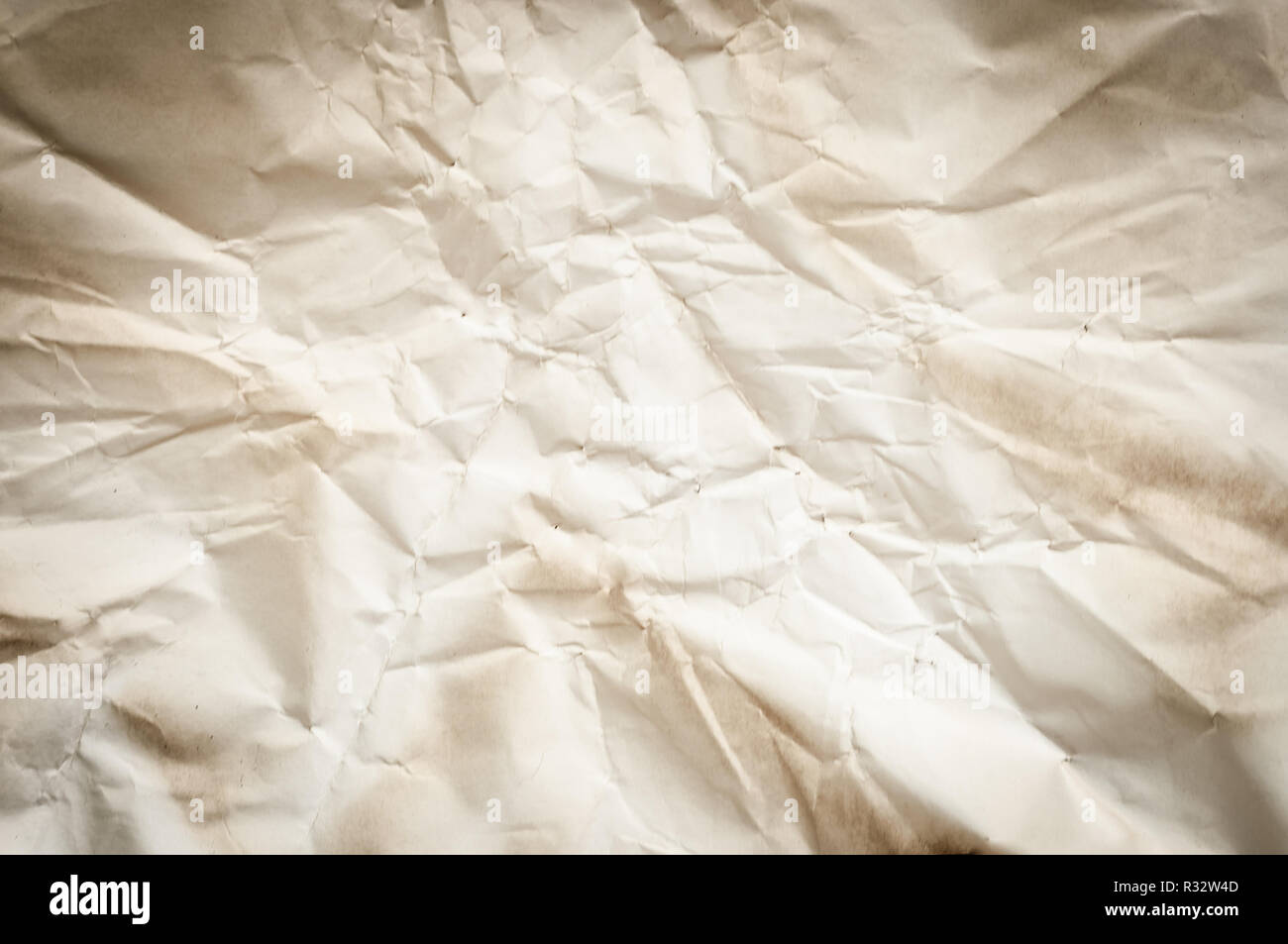 Background texture of crumpled aged paper with spot and stain Stock ...