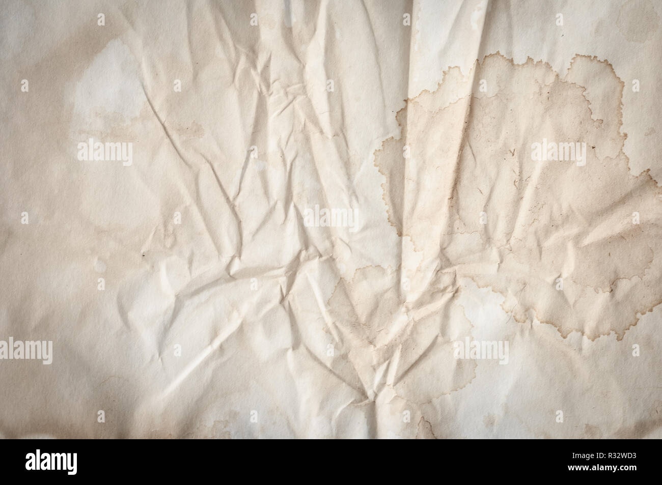 Background texture of crumpled aged paper with spot and stain Stock ...