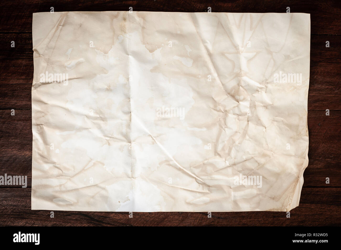 Background texture of crumpled aged paper with spot and stain Stock ...