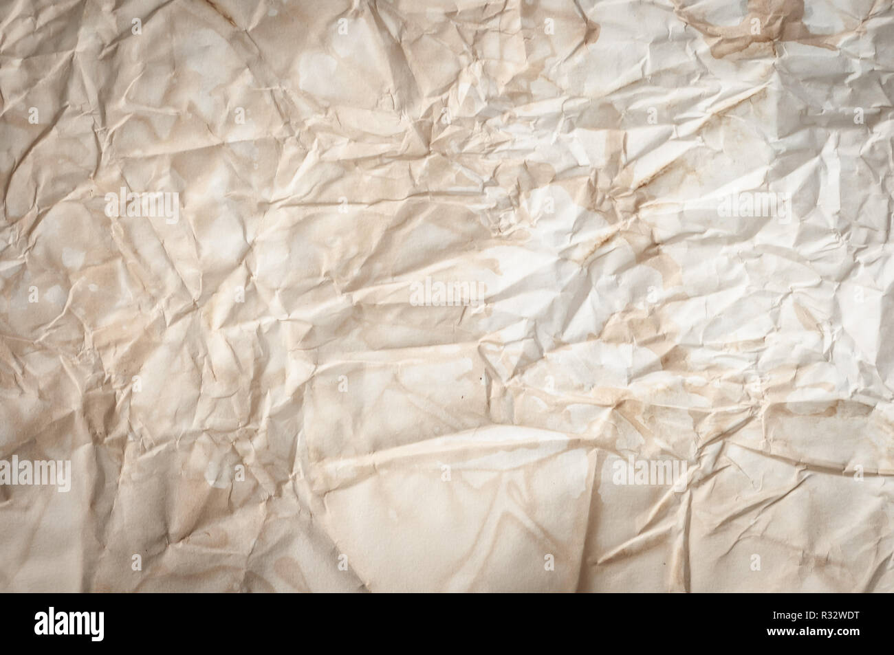 Background texture of crumpled aged paper with spot and stain Stock ...