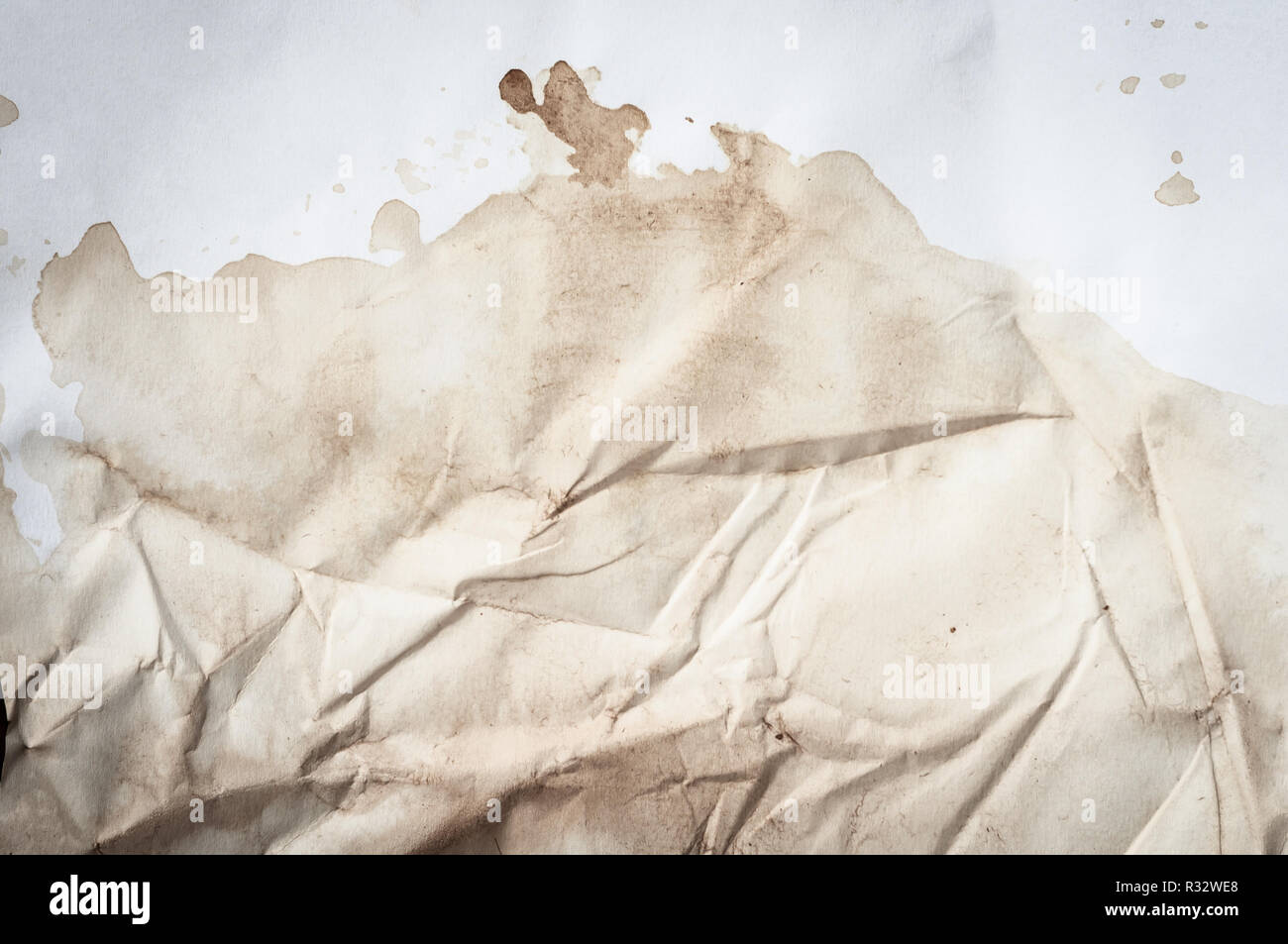 Background texture of crumpled aged paper with spot and stain Stock ...