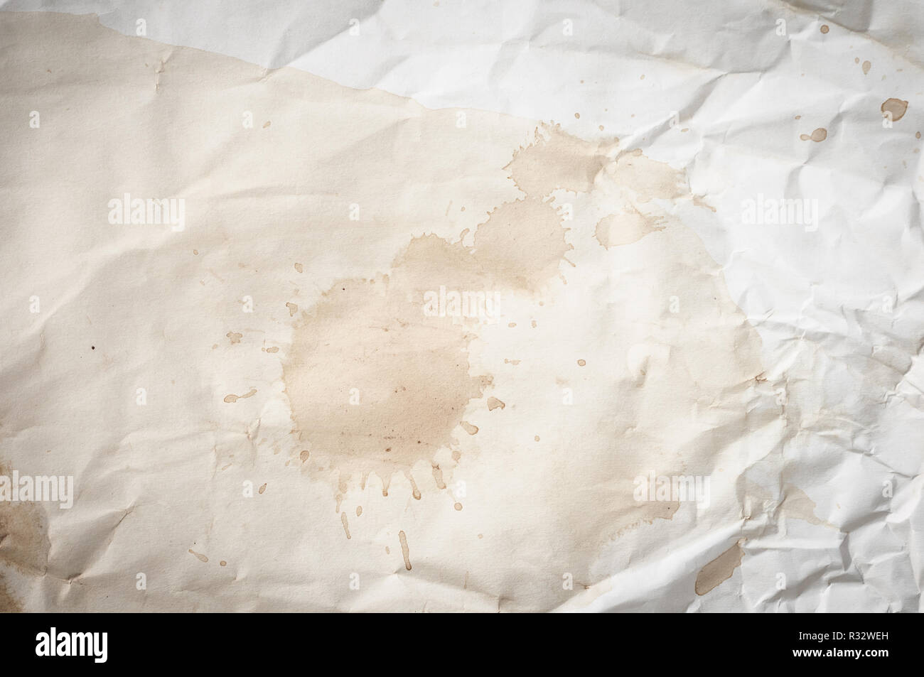 Background texture of crumpled aged paper with spot and stain Stock ...