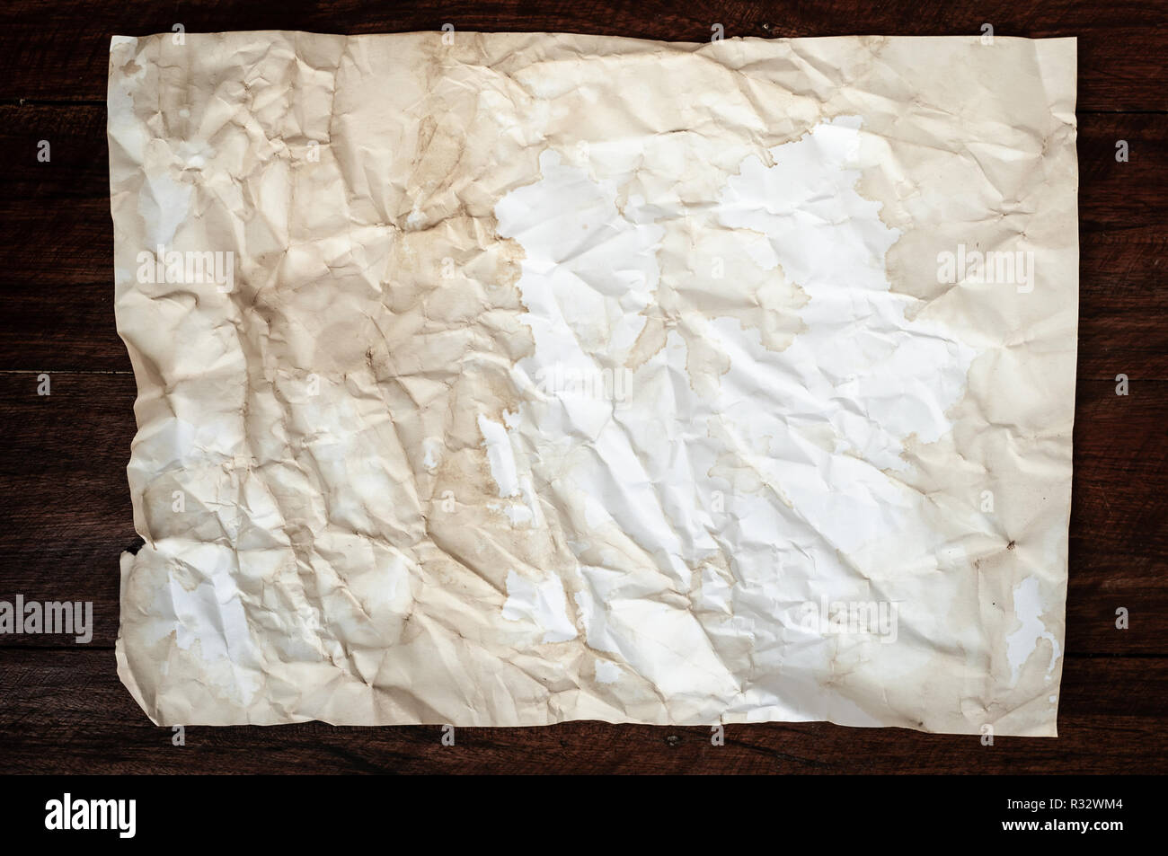 Background texture of crumpled aged paper with spot and stain Stock ...
