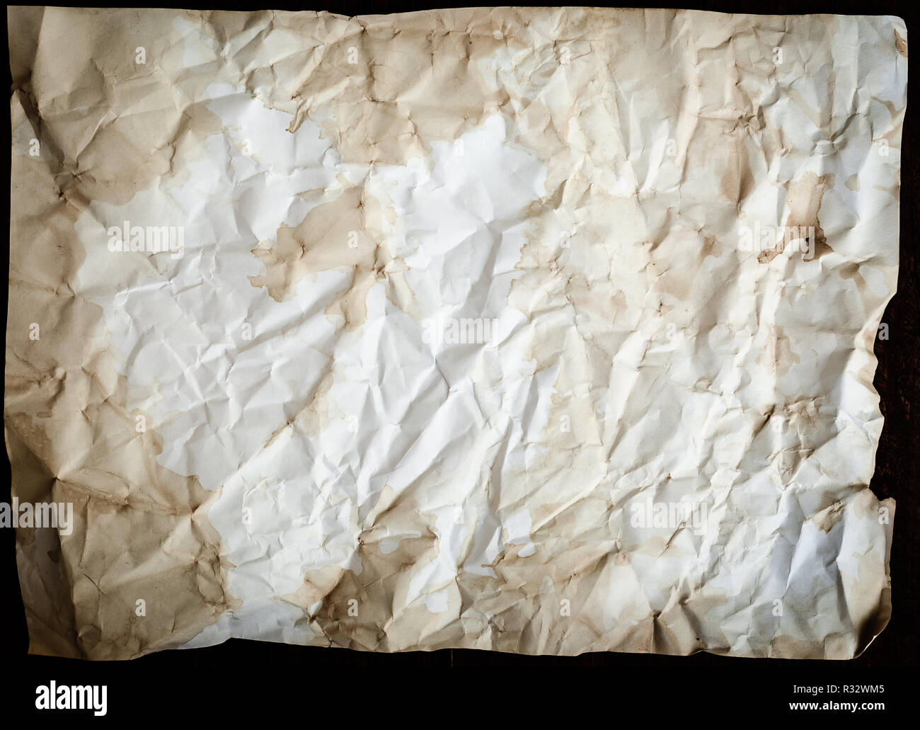 Background texture of crumpled aged paper with spot and stain Stock ...