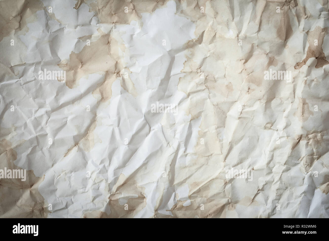Background texture of crumpled aged paper with spot and stain Stock ...