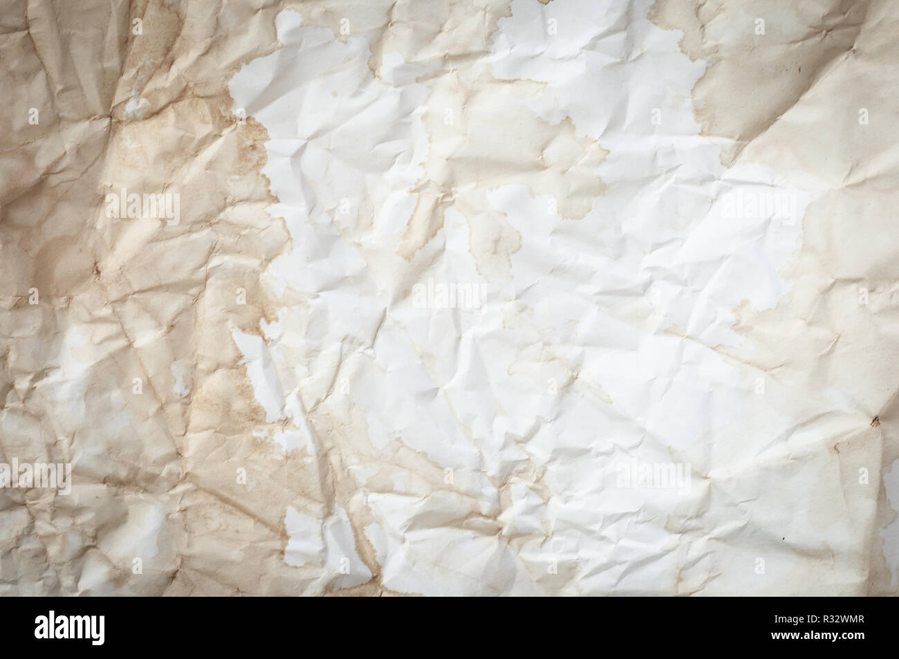 Background texture of crumpled aged paper with spot and stain Stock ...