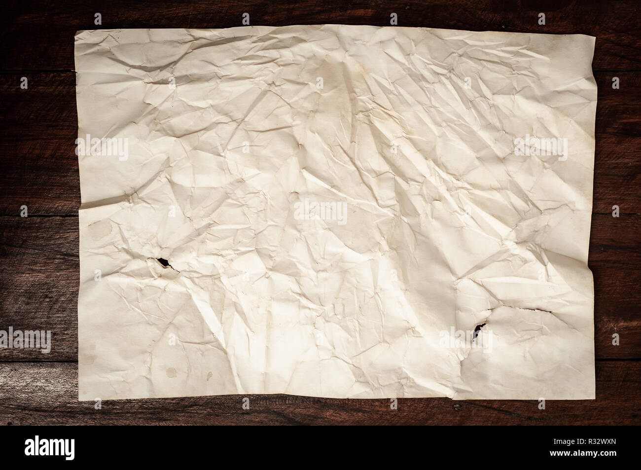Background texture of crumpled aged paper with spot and stain Stock ...