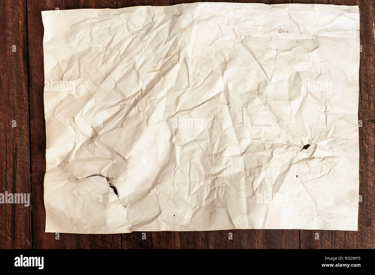 Background texture of crumpled aged paper with spot and stain Stock ...