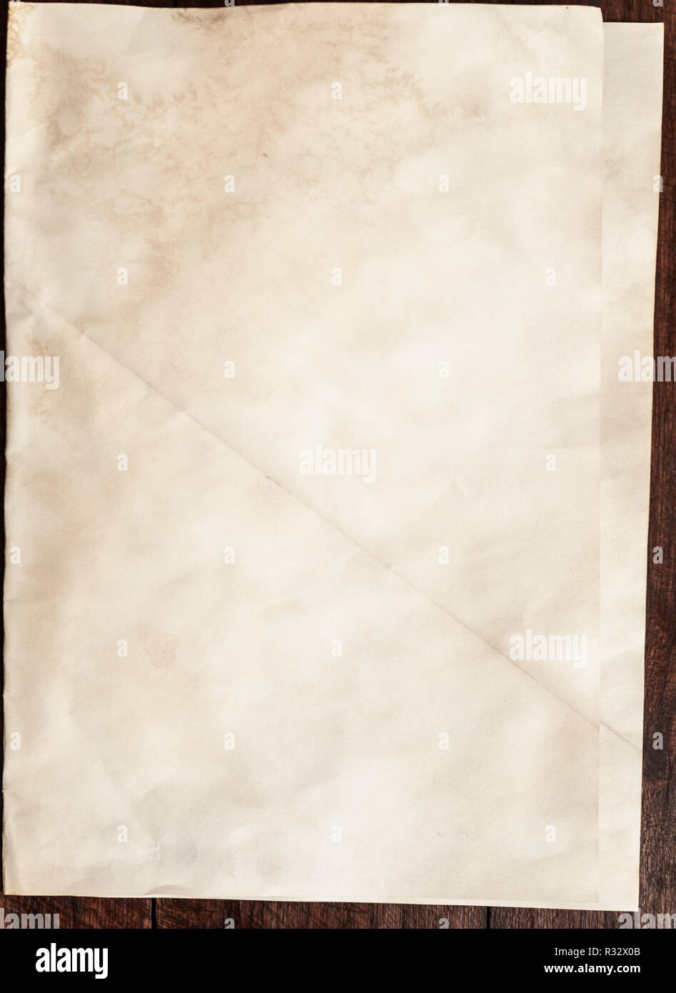 Background texture of crumpled aged paper with spot and stain Stock ...
