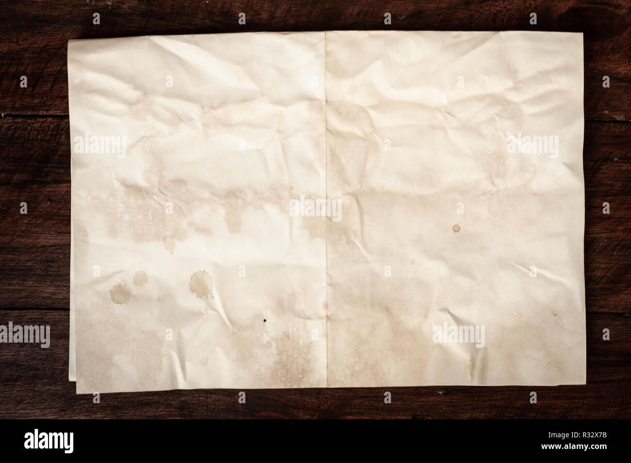 Background texture of crumpled aged paper with spot and stain Stock ...