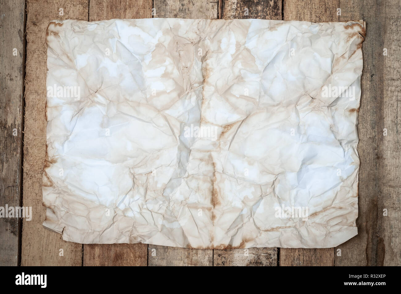 Vintage Crumpled paper texture on wooden table Stock Photo - Alamy