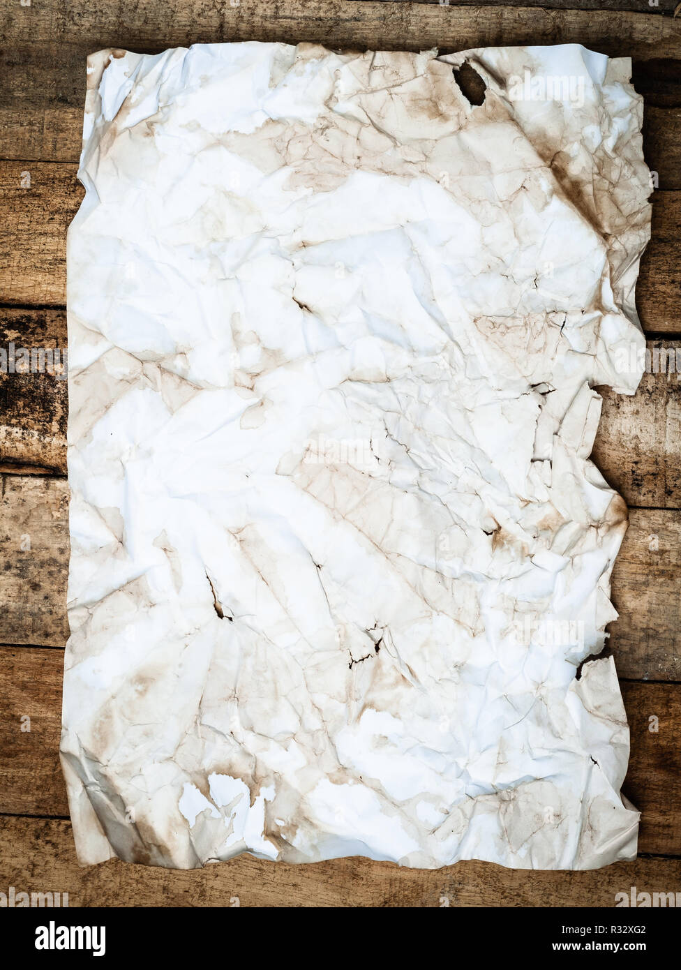 Vintage Crumpled paper texture on wooden table Stock Photo - Alamy