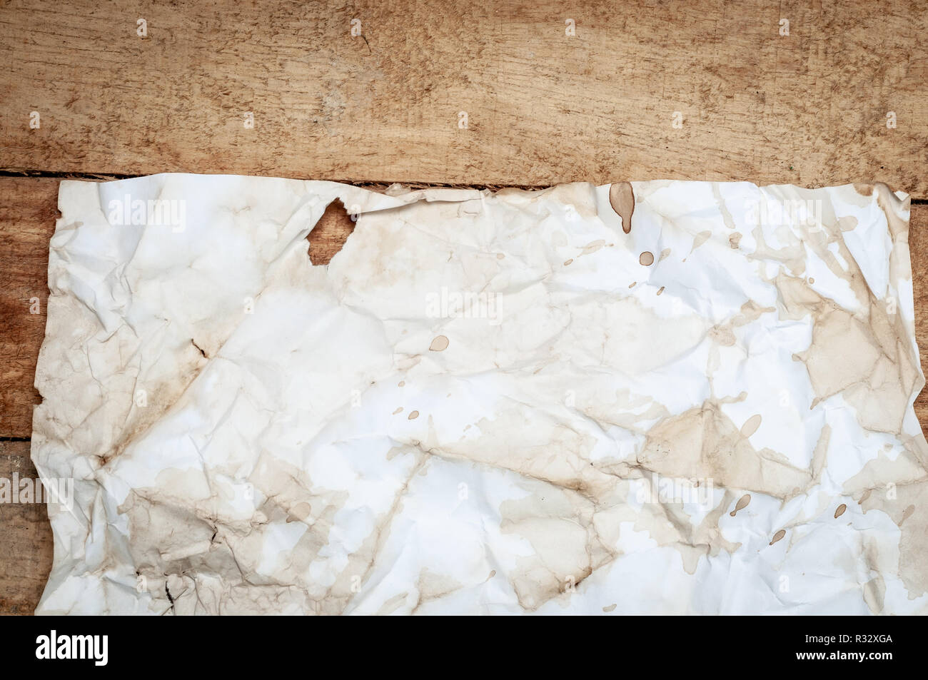 Vintage Crumpled paper texture on wooden table Stock Photo - Alamy