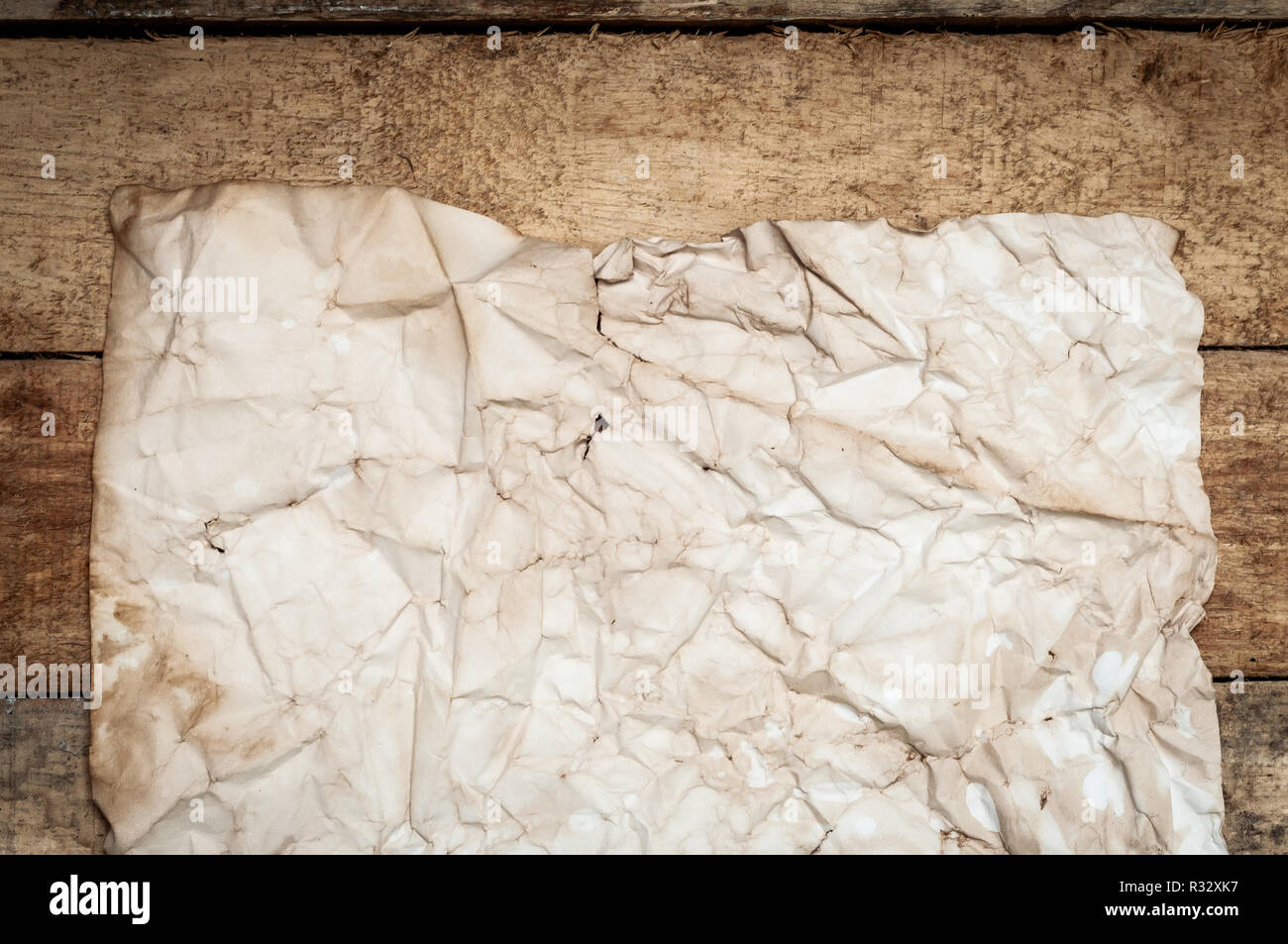 Vintage Crumpled paper texture on wooden table Stock Photo - Alamy