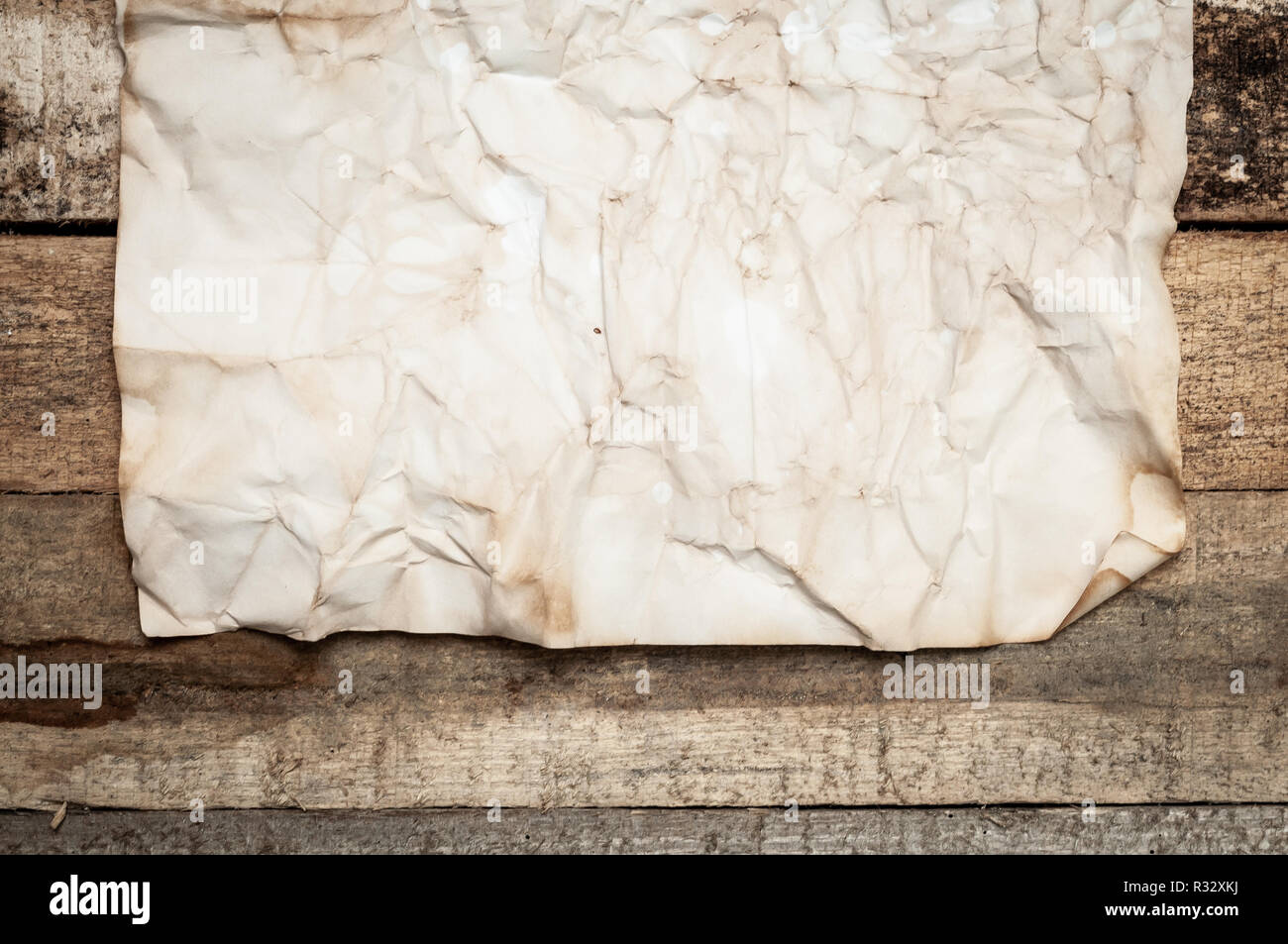 Vintage Crumpled paper texture on wooden table Stock Photo - Alamy