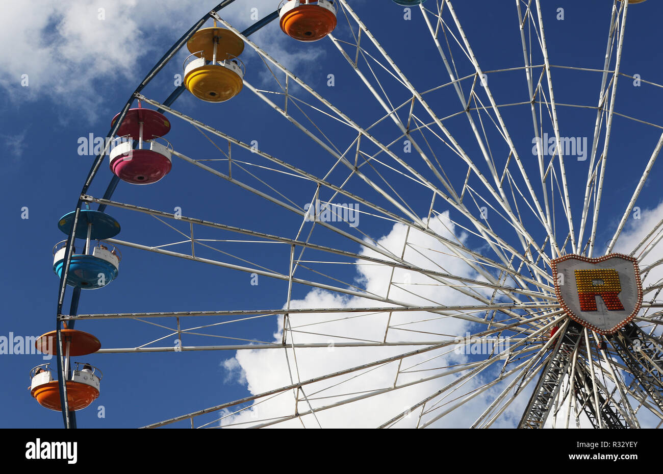 Ferris Wheel carnival ride against blue sky and puffy clouds. Canfield ...