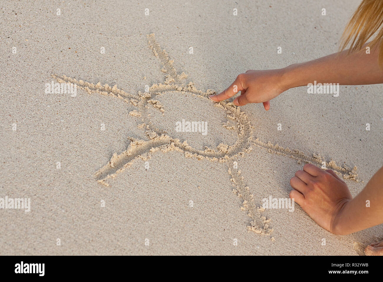 Woman painting in sand hi-res stock photography and images - Alamy