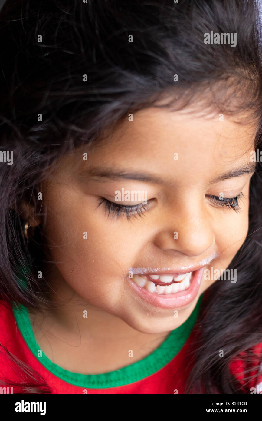 Beautiful face of girl in Christmas Stock Photo - Alamy