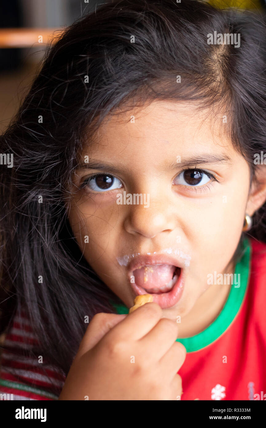 Beautiful face of girl in Christmas Stock Photo - Alamy