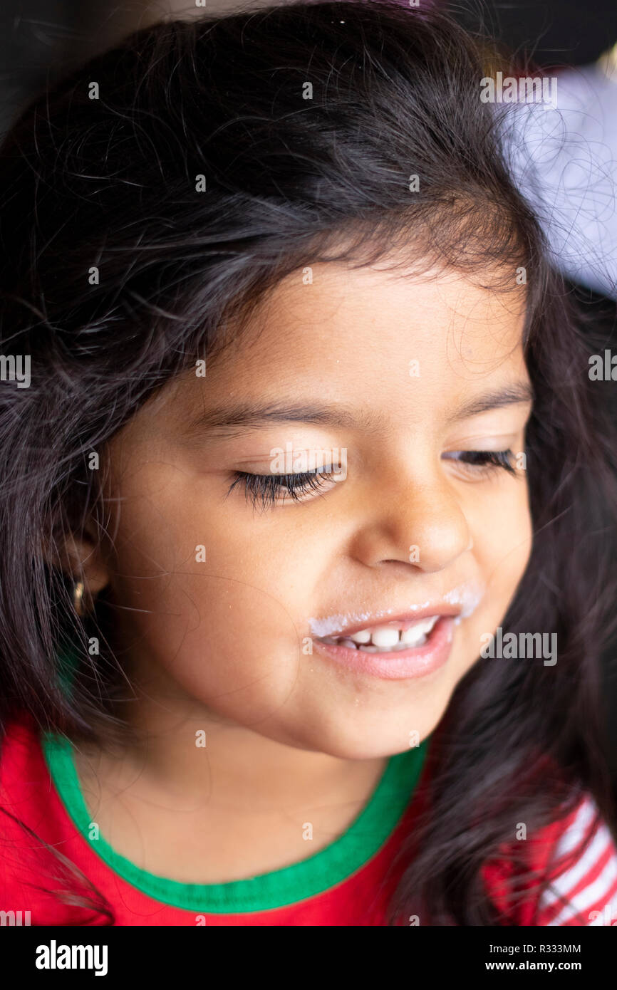 Beautiful face of girl in Christmas Stock Photo - Alamy