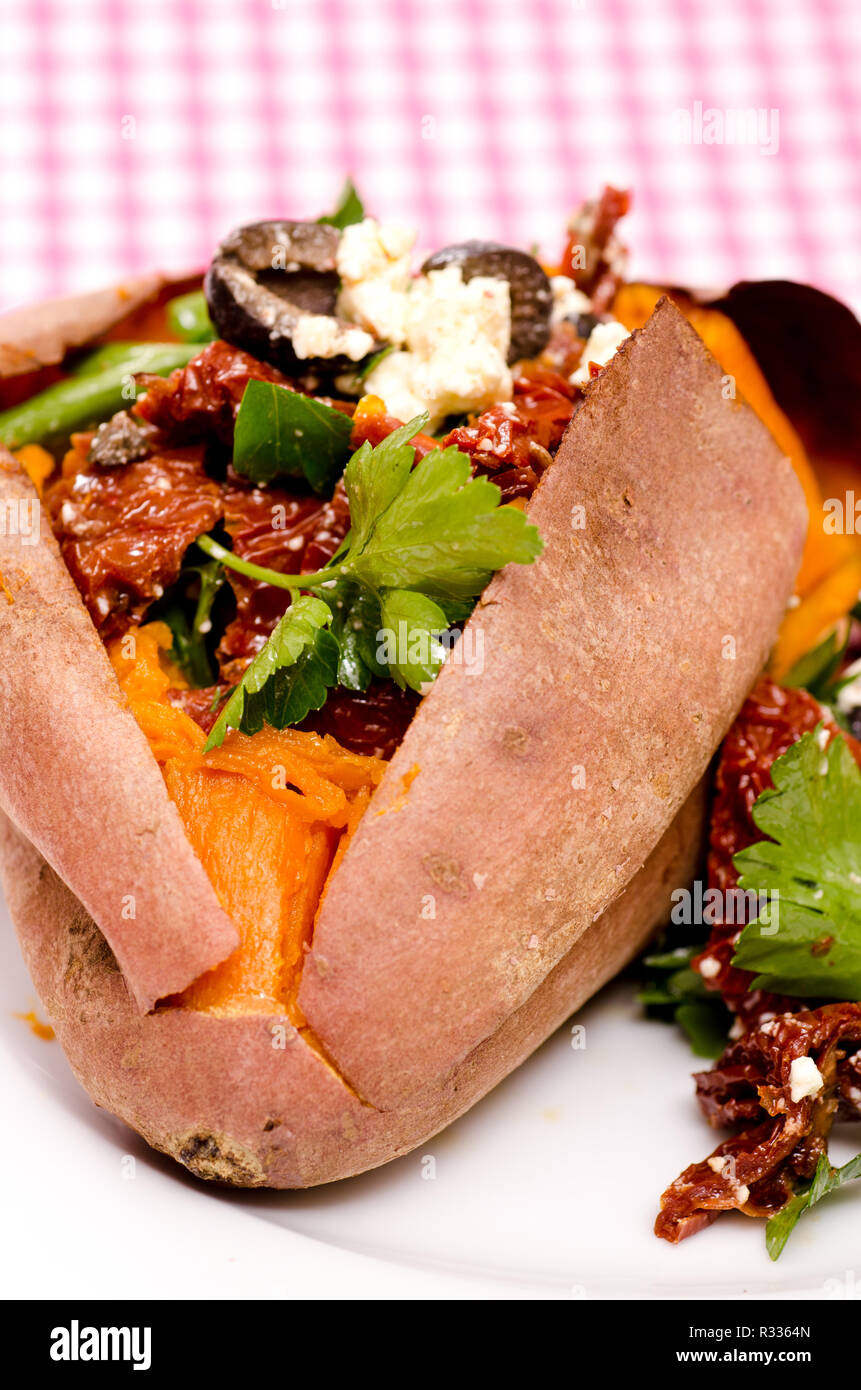 stuffed sweet potato in portrait Stock Photo - Alamy