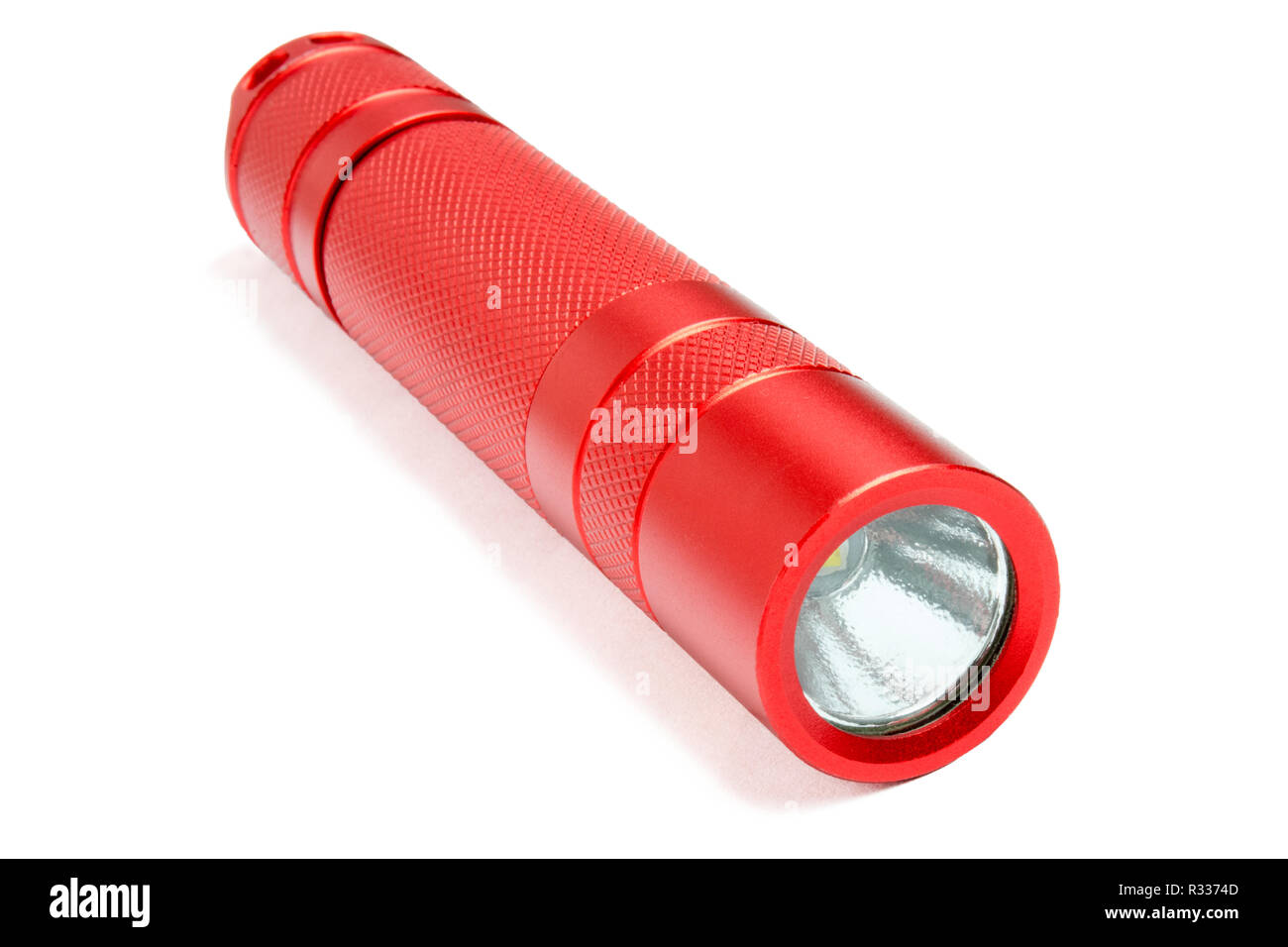 Red led pocket torch light isolated on white background. Modern ...