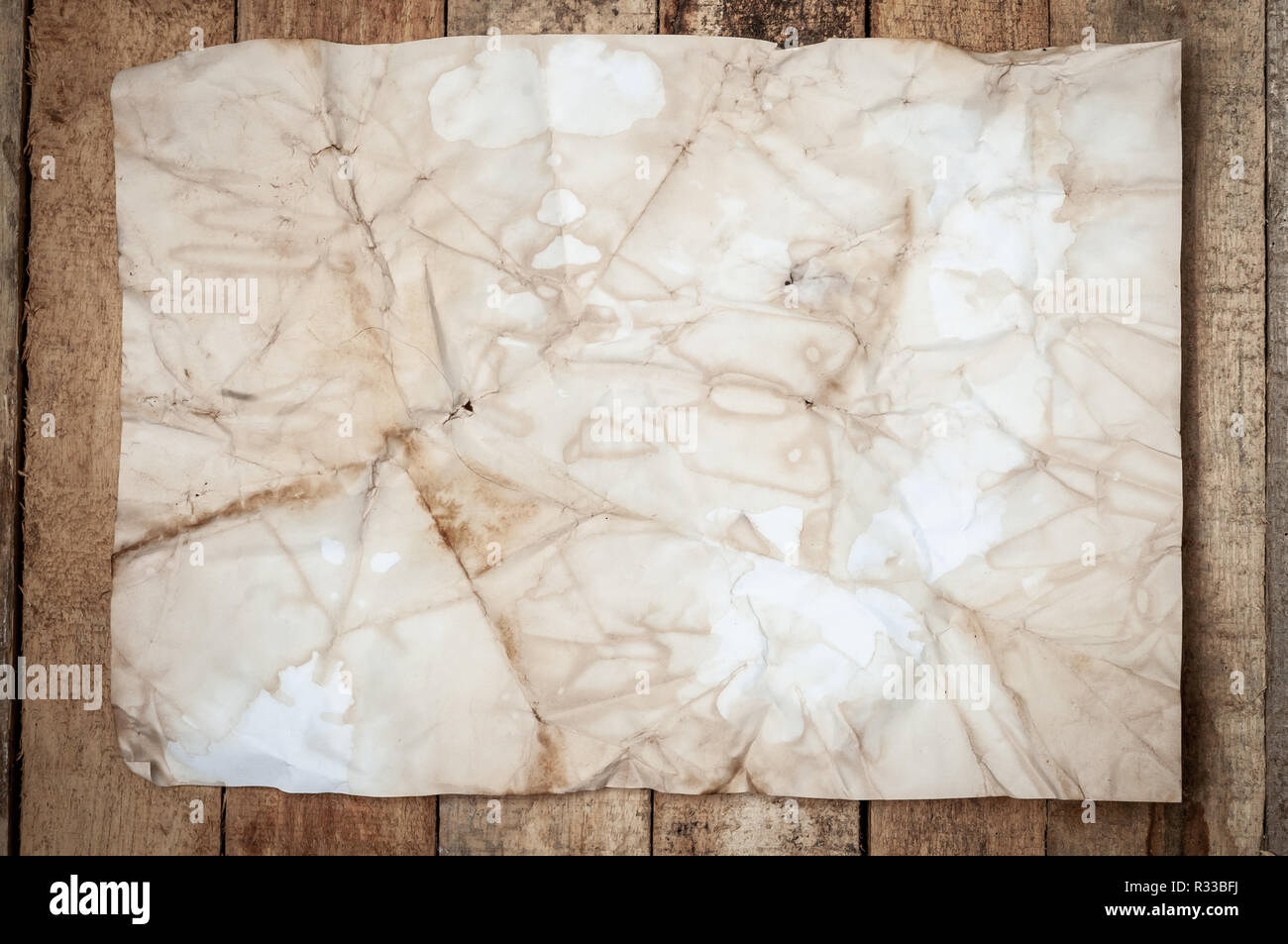 Vintage Crumpled paper texture on wooden table Stock Photo - Alamy