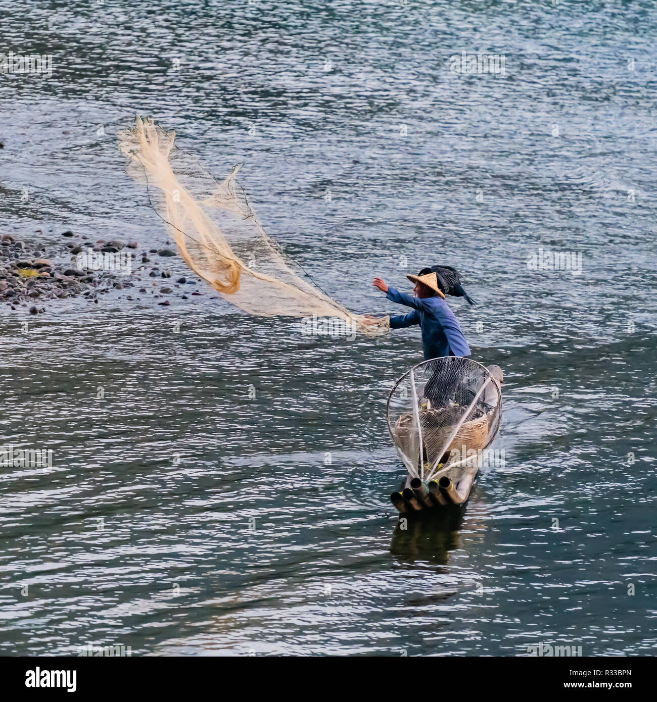 Cormorant fisherman on the Lijiang river, Xiping, China Stock Photo - Alamy