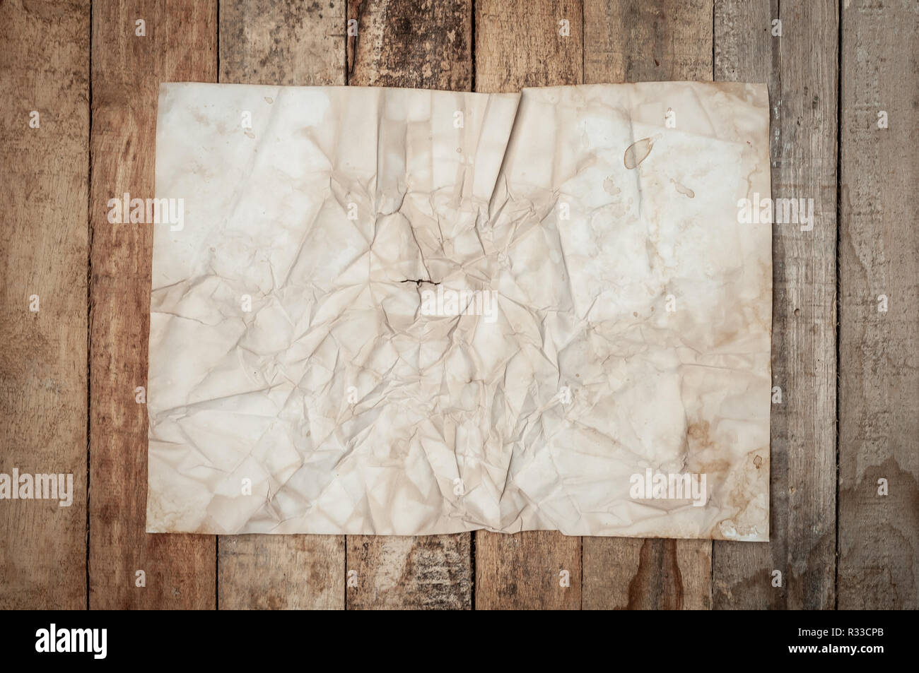 Vintage Crumpled paper texture on wooden table Stock Photo - Alamy