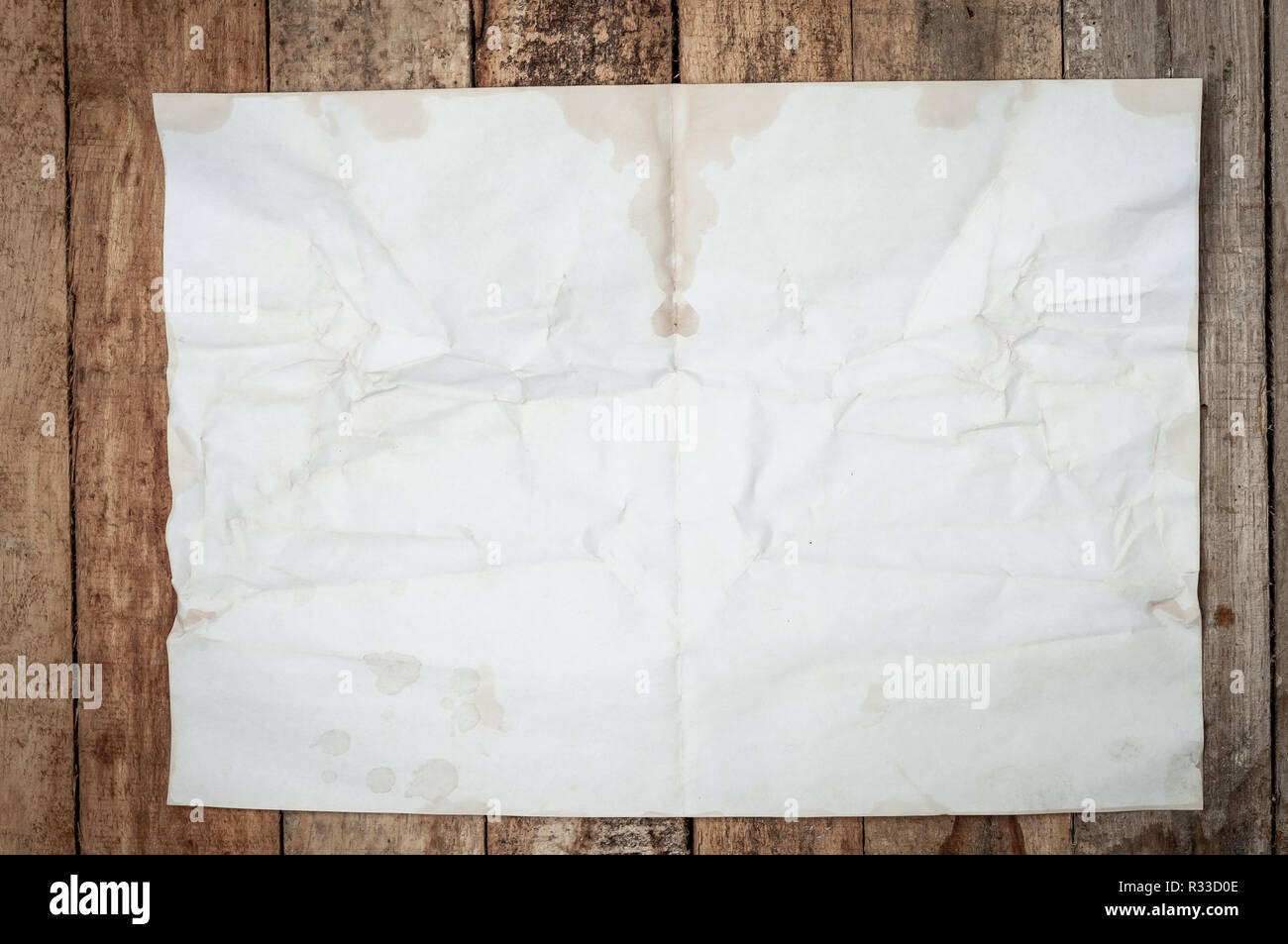 Empty Vintage Crumpled paper letter texture on wooden table surface ...