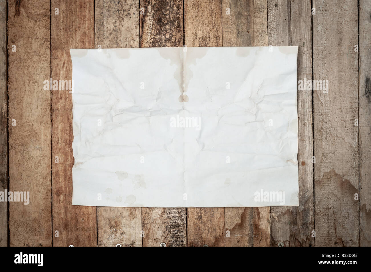 Empty Vintage Crumpled paper letter texture on wooden table surface ...