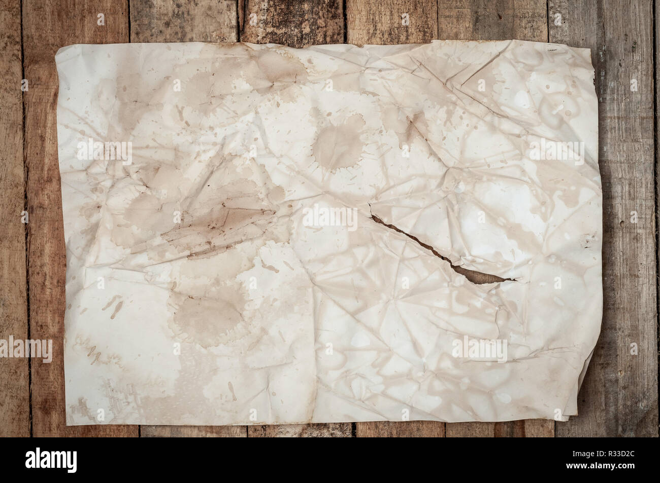 Empty Vintage Crumpled paper letter texture on wooden table surface ...