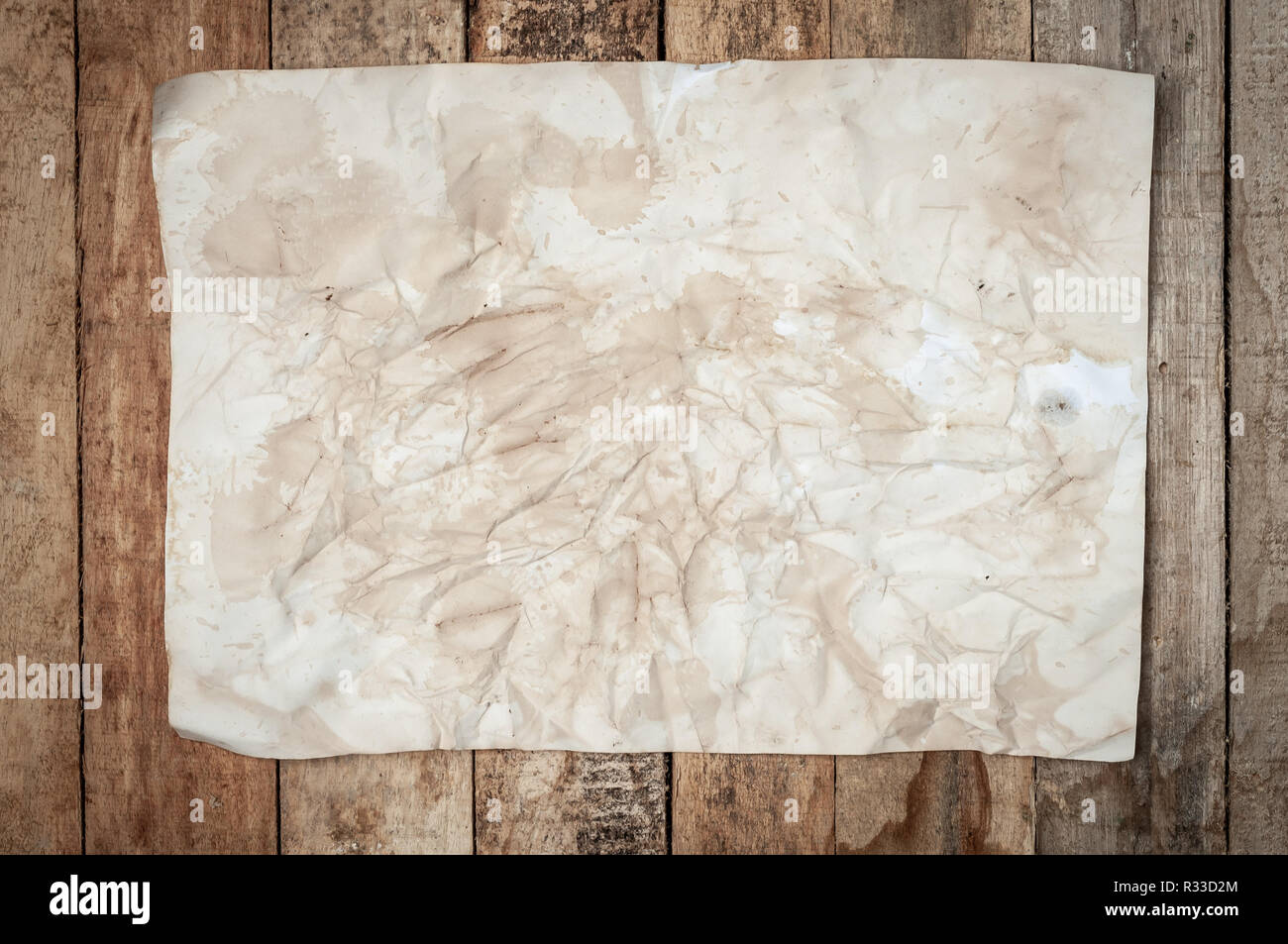 Empty Vintage Crumpled paper letter texture on wooden table surface ...