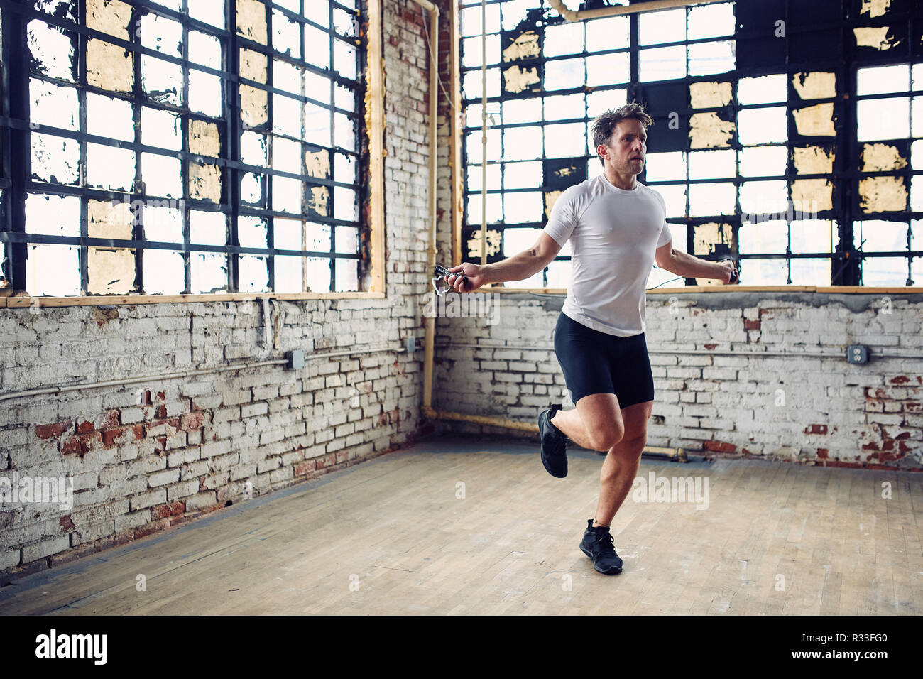 Muscular man skipping rope hi-res stock photography and images - Alamy