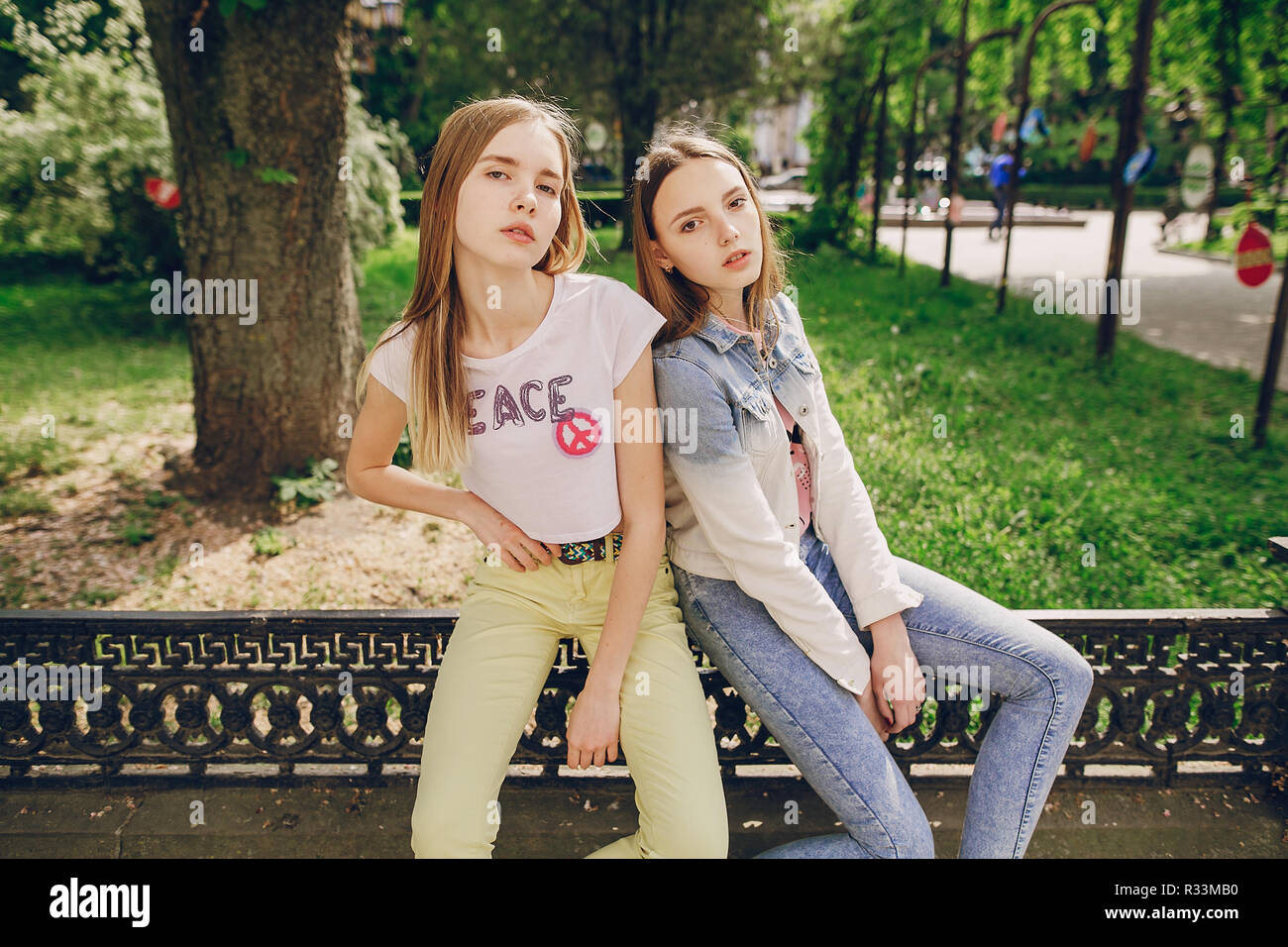 beautiful models pose for a photo in trendy clothes Stock Photo - Alamy
