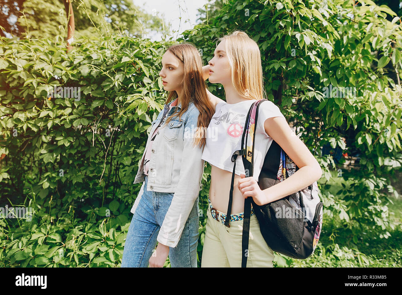 beautiful models pose for a photo in trendy clothes Stock Photo - Alamy