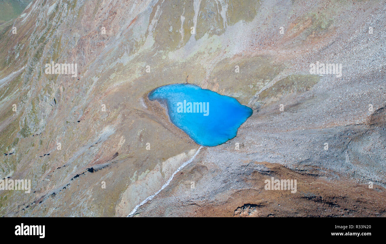 Alpine lake, incredible colour. Aerial photo Stock Photo - Alamy