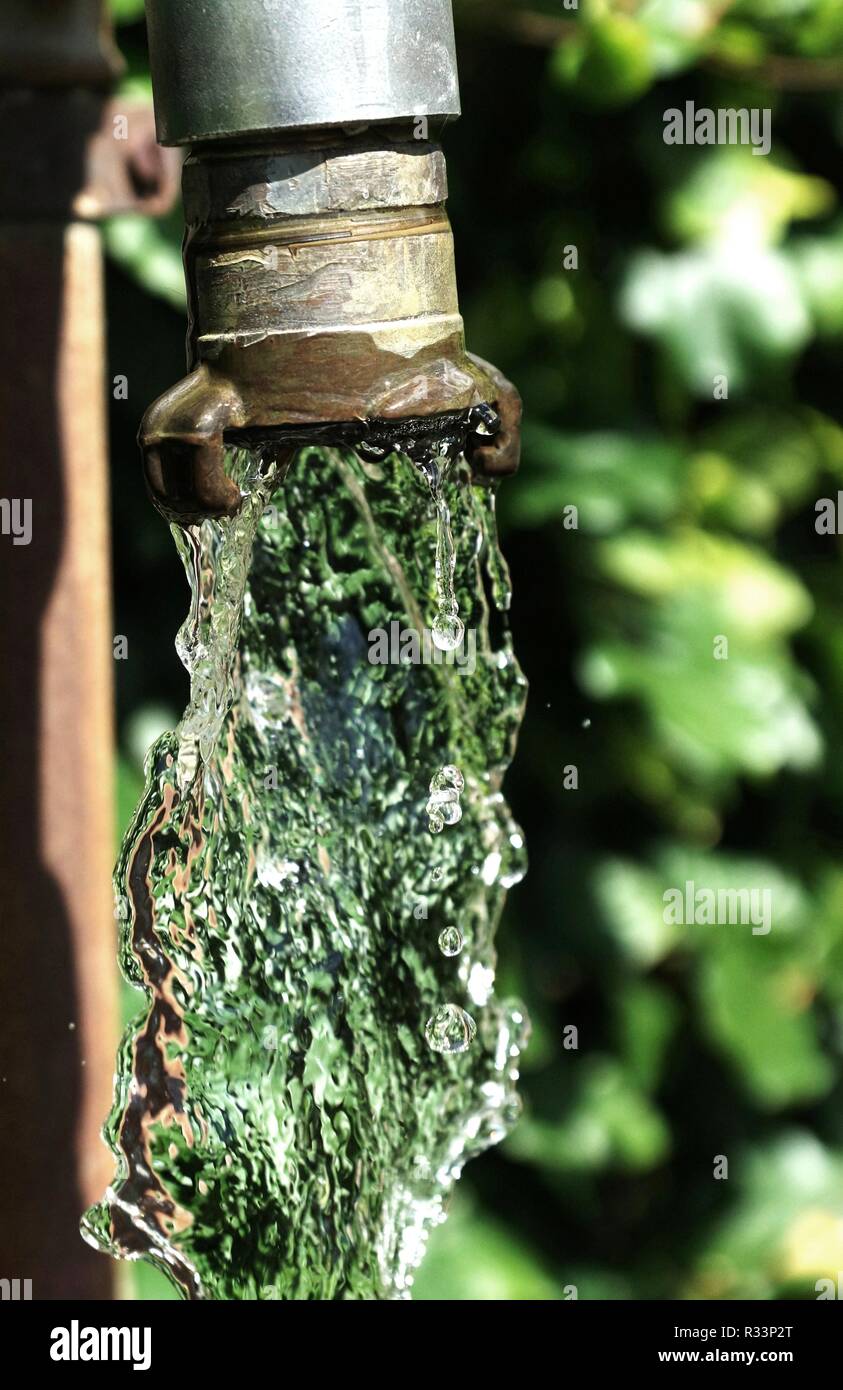 faucet from the water flowing Stock Photo - Alamy