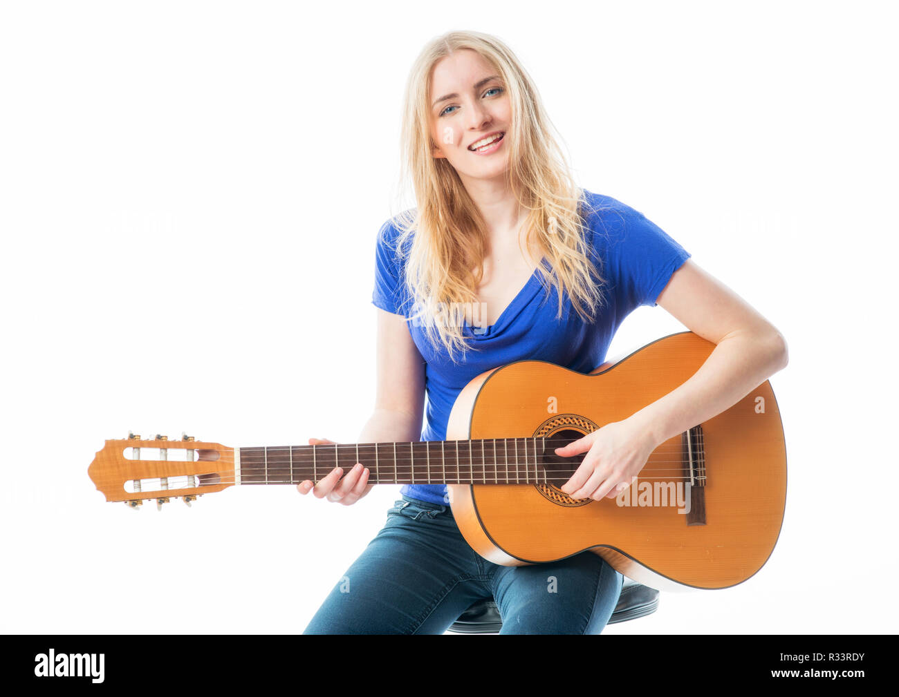 Guitarist plays guitar girl hi-res stock photography and images - Alamy