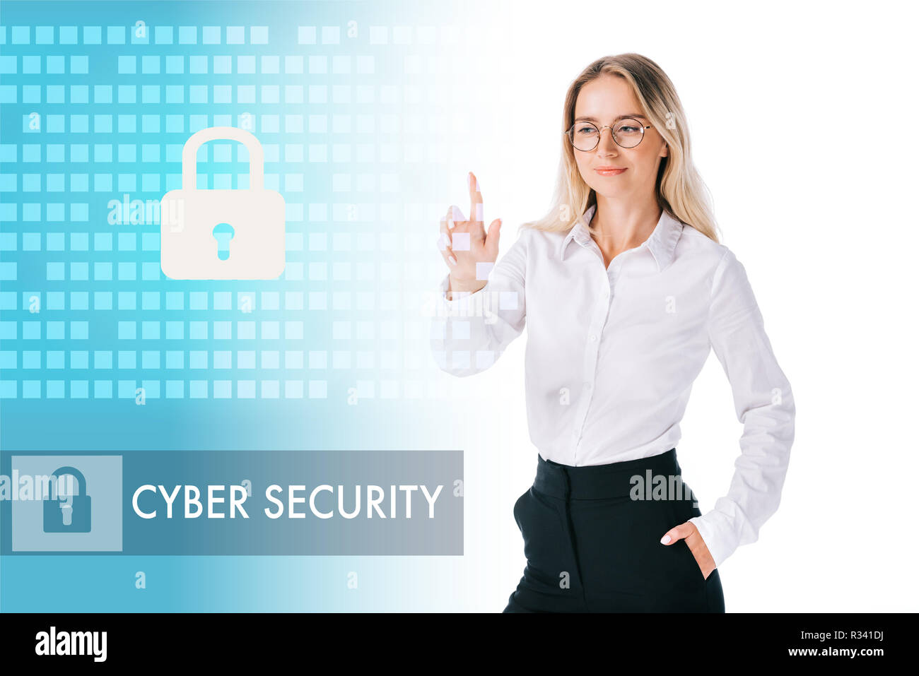 portrait of smiling businesswoman in formal wear pointing at cyber ...