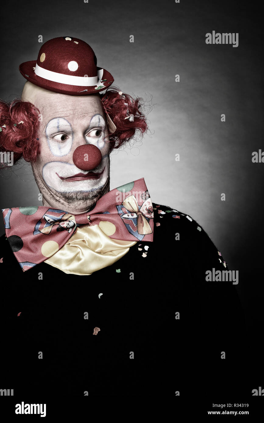 Red and black clown costume hi-res stock photography and images - Alamy