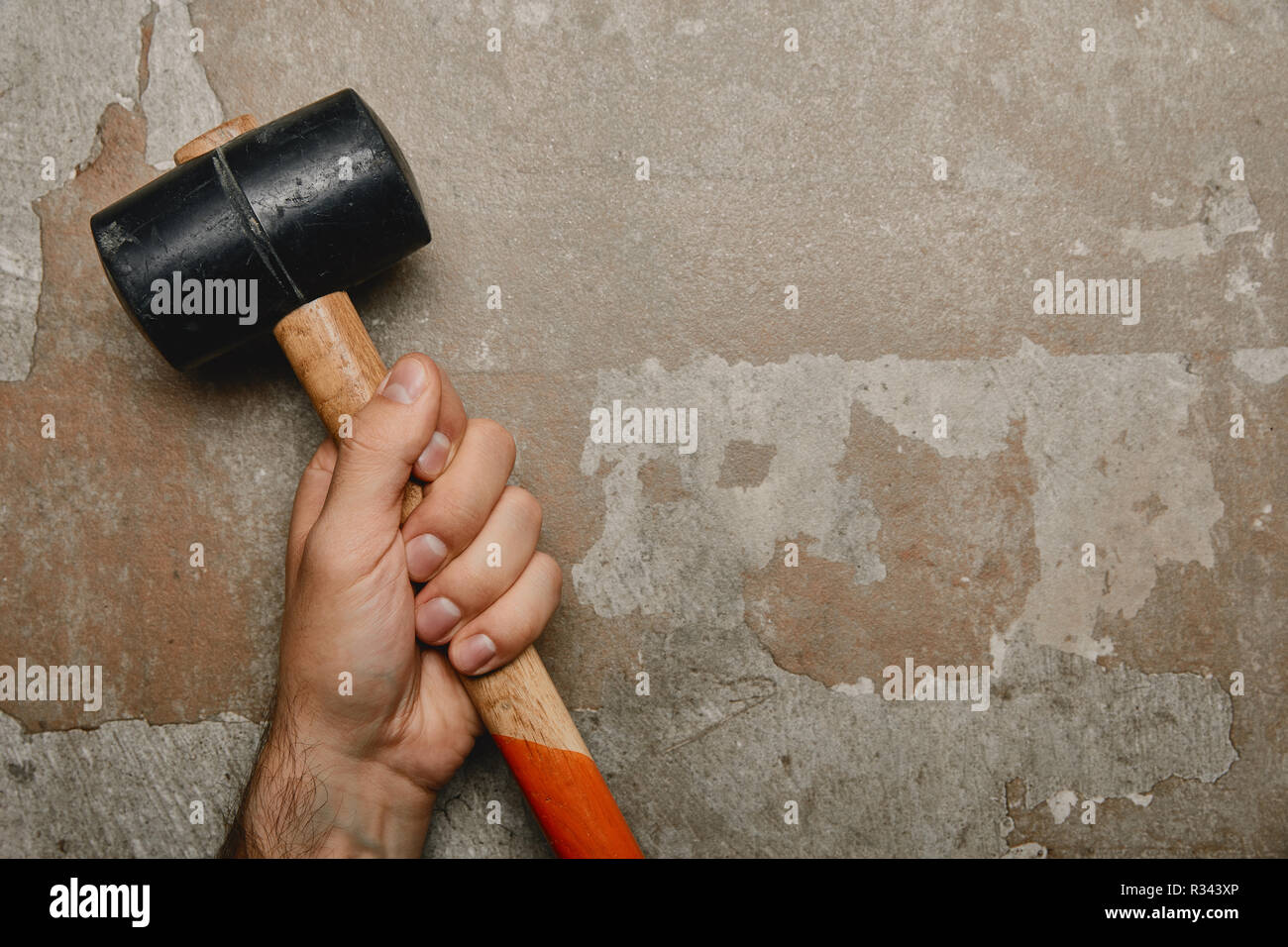 Man holding mallet hi-res stock photography and images - Alamy