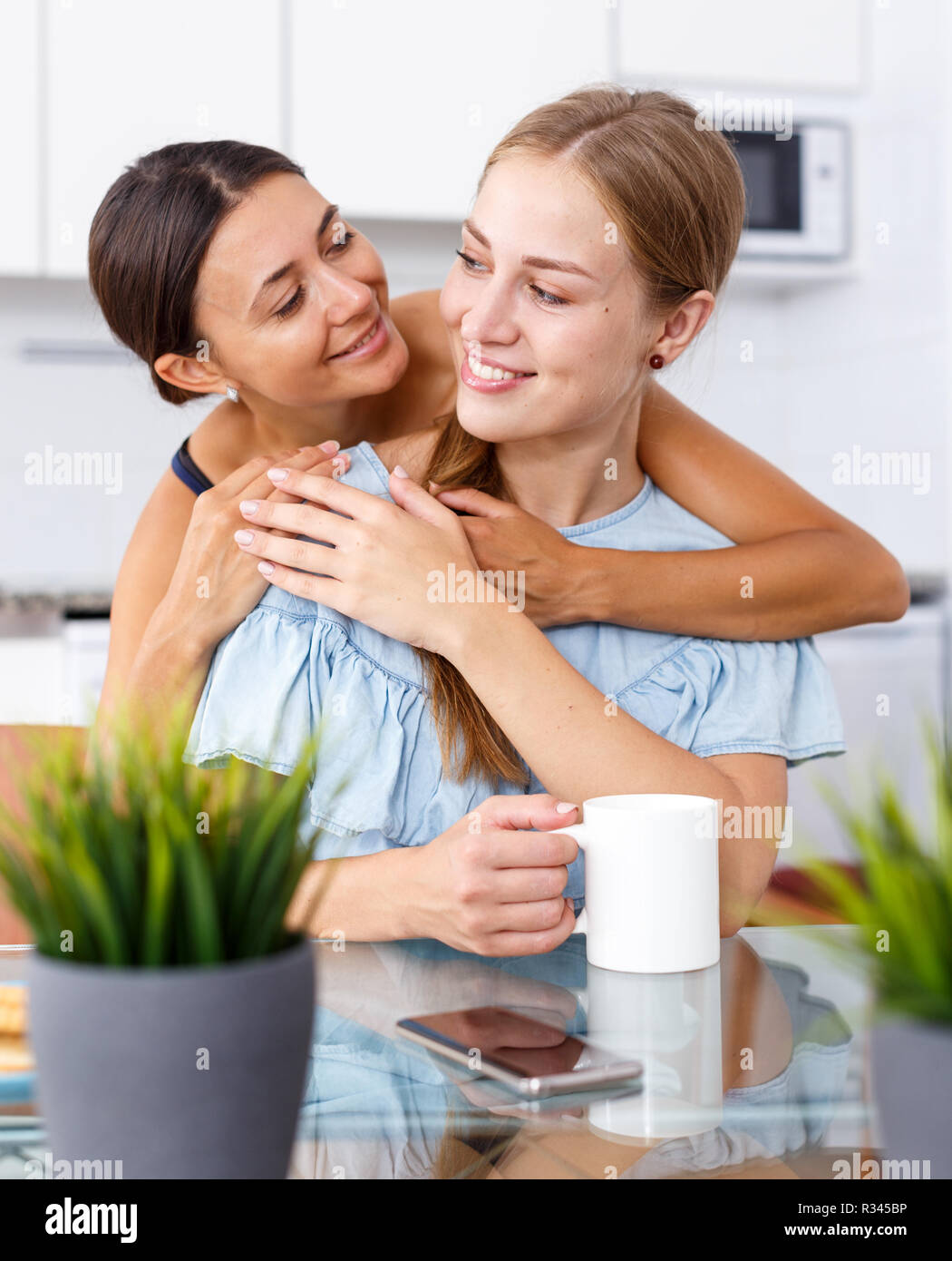 Girlfriends hugging hi-res stock photography and images - Alamy