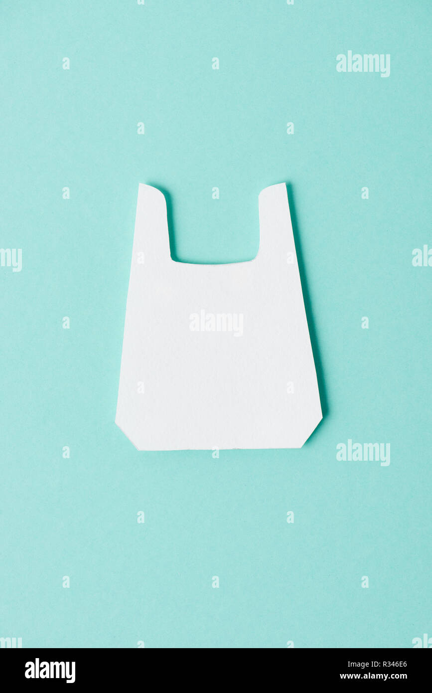 Model of white packet on blue background Stock Photo - Alamy