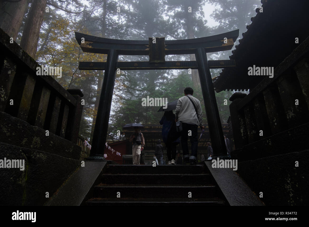 Japanese wood gate leading to a hilltop Shinto shrine at Toshogu in ...