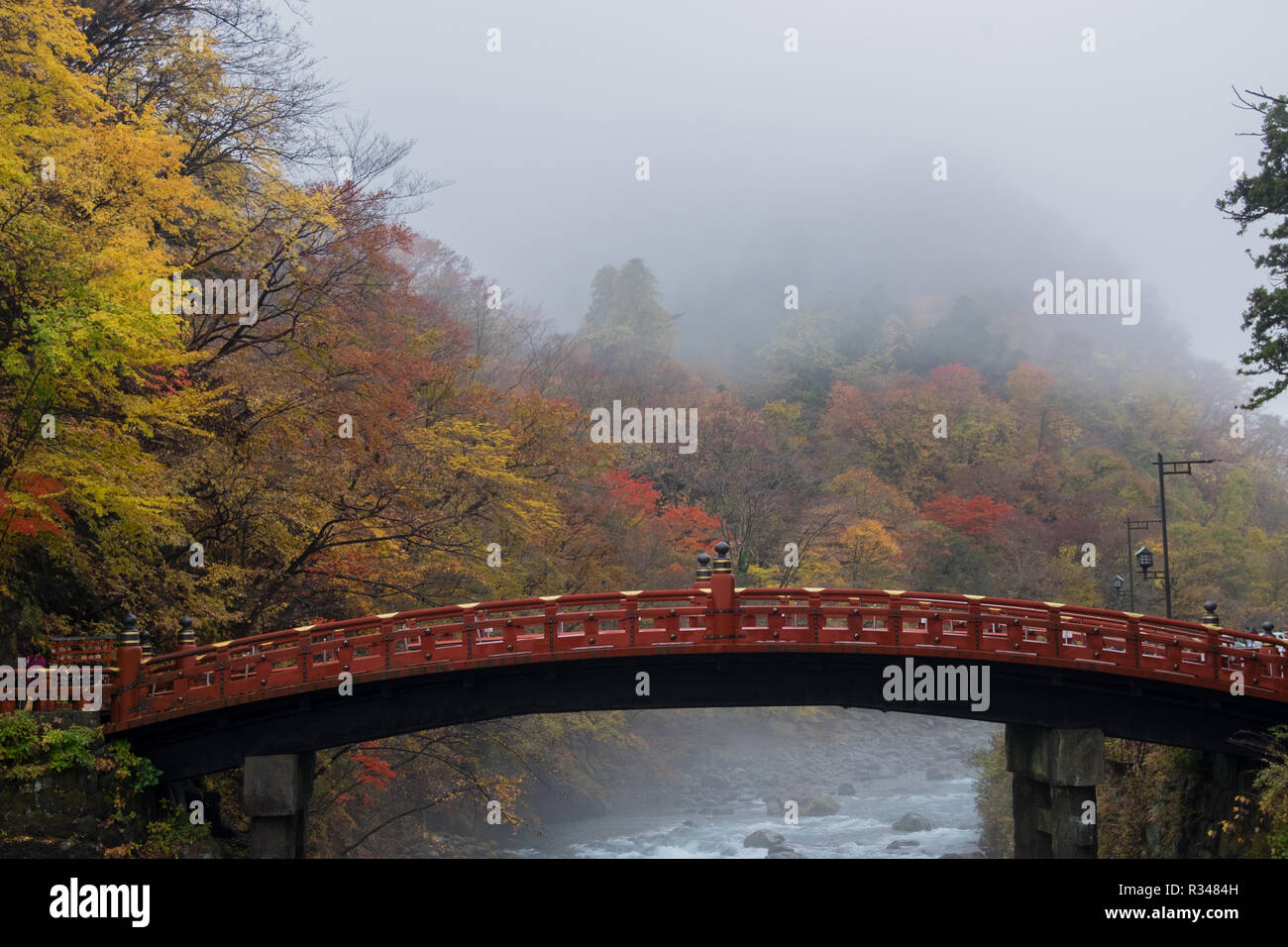 Looking at the beautiful Shinkyo bridge in Nikko, Japan on a misty ...