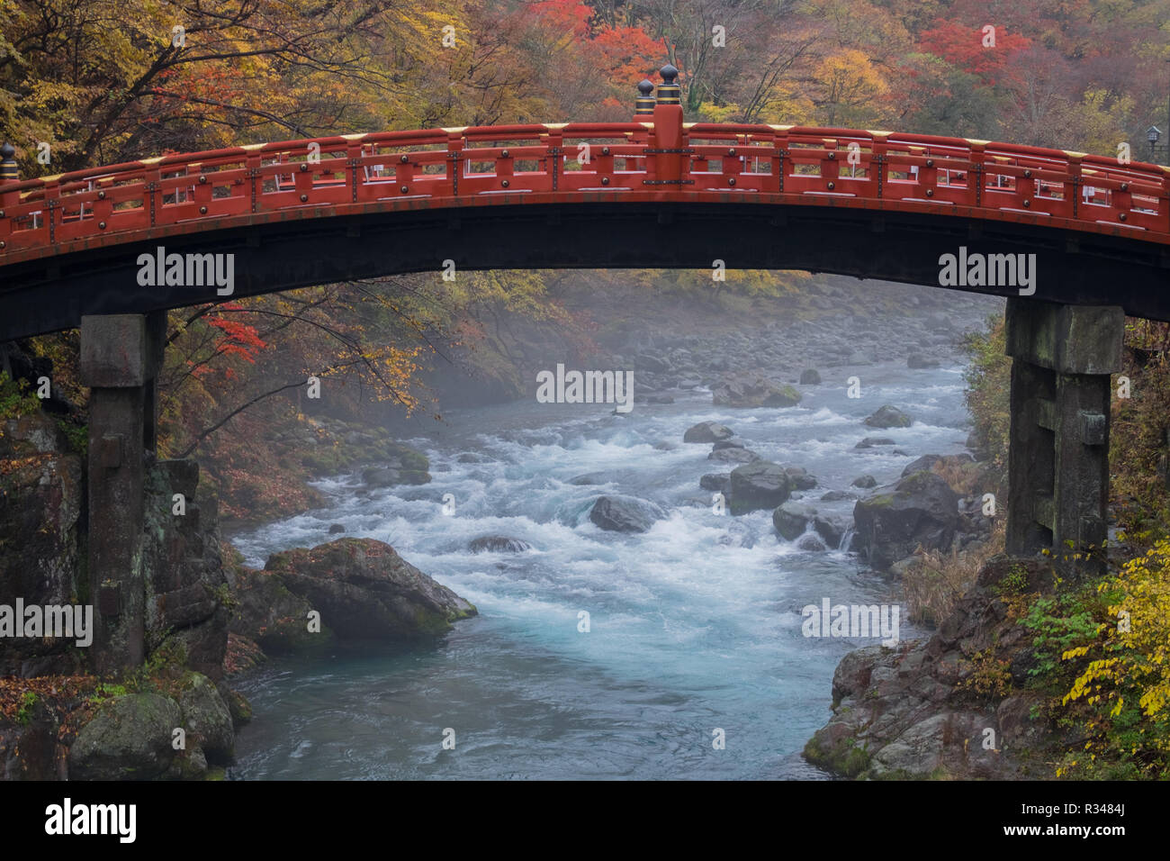 Looking at the beautiful Shinkyo bridge in Nikko, Japan on a misty ...