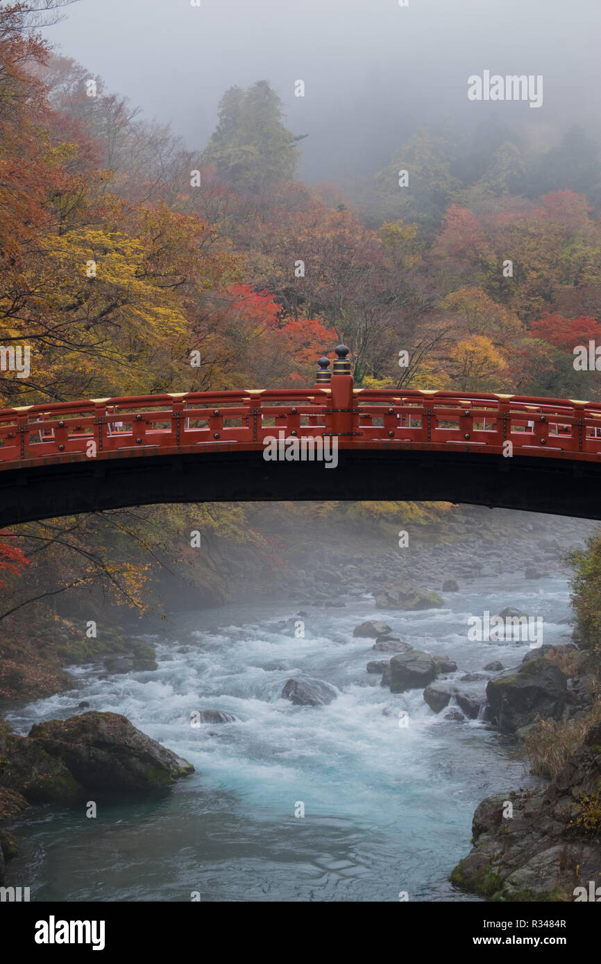Looking at the beautiful Shinkyo bridge in Nikko, Japan on a misty ...